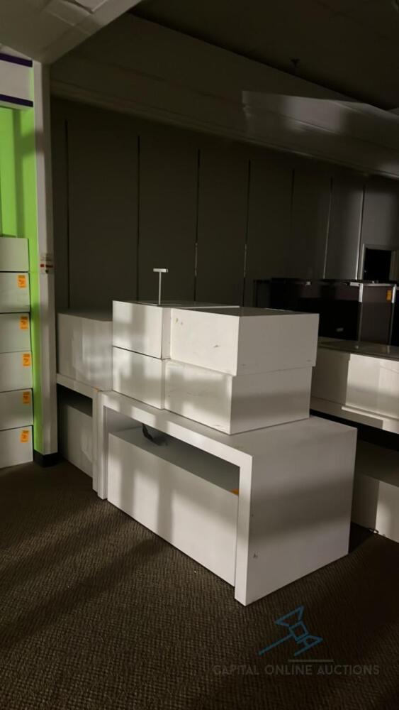 Lot of White tables and boxes, hanging displays