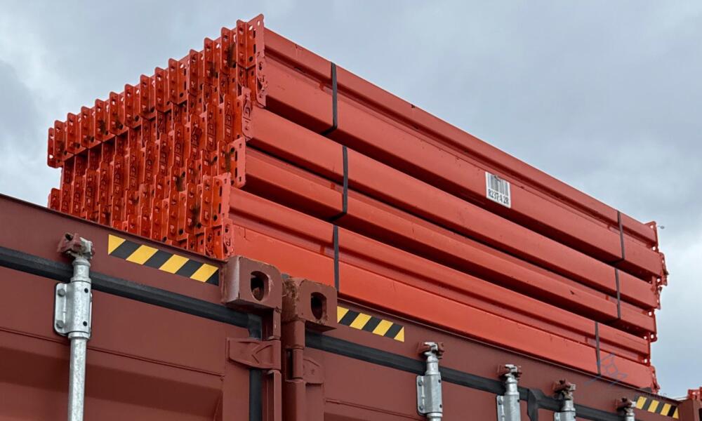 Pallet of orange 8 foot cross beams for pallet racking